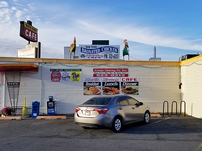 The iconic North Hi-Way Cafe sign stands tall against the Idaho sky, a beacon of breakfast hope for hungry travelers and locals alike.
