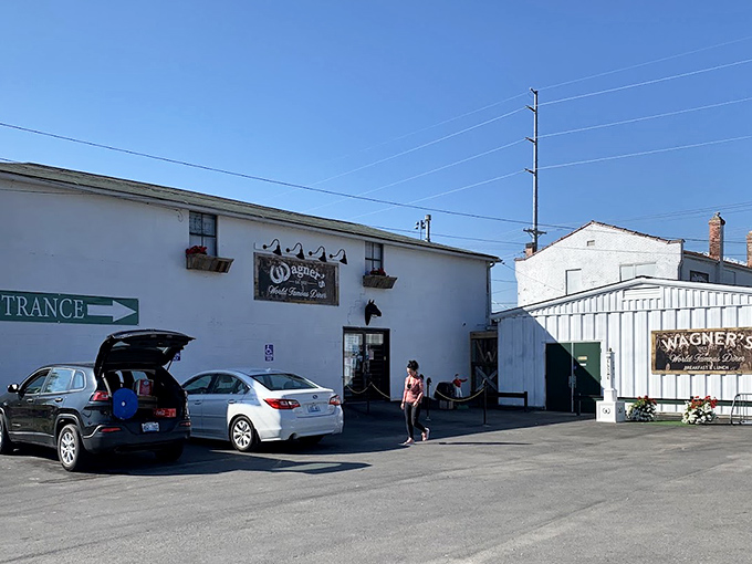 The unassuming exterior of Wagner's Pharmacy hides a century of racing history and breakfast perfection just steps from Churchill Downs.