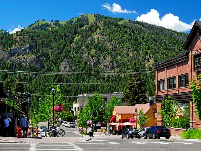 Historic brick buildings line Ketchum's charming streets, where spring blossoms frame architecture that whispers stories of Idaho's mining past.