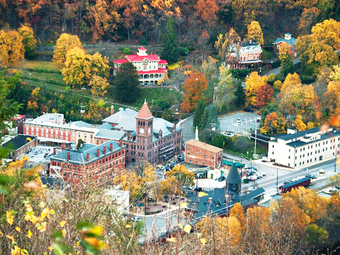 Broadway beckons with its rainbow of Victorian facades, where the clock tower stands sentinel over a street that time politely decided to respect.
