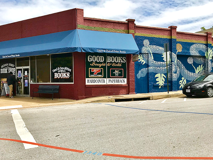 The brick-red exterior with its cheerful blue awning beckons bibliophiles like a literary lighthouse on Fayetteville's Dickson Street. This isn't just a store&mdash;it's a destination.