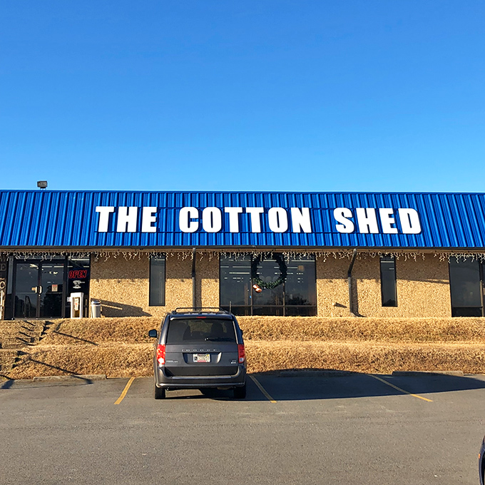 The bright blue roof of The Cotton Shed beckons like a retail oasis in Searcy, promising treasures inside that big box stores could only dream about.