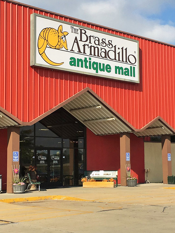 The iconic red exterior of Brass Armadillo feels like finding a treasure chest before you've even stepped inside. Prepare for an adventure!