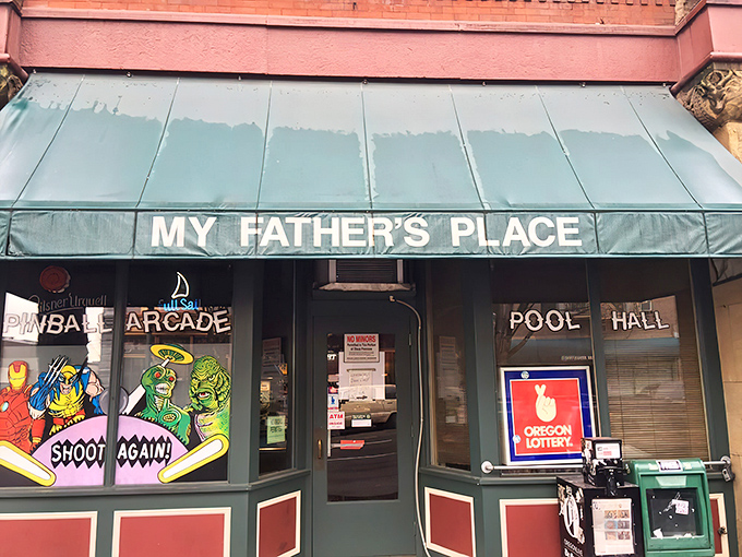 Sunlight catches the vintage storefront of My Father's Place &ndash; where Portland's most authentic dive experience awaits with zero pretension and maximum character. 