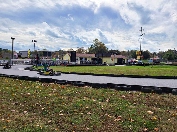 The sun-drenched track awaits its next speed demons, with tire barriers standing guard like patient sentinels against overzealous cornering attempts.
