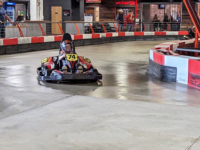 The unassuming exterior of High Voltage Indoor Karting hides the adrenaline-pumping paradise within, like finding a Ferrari engine inside a station wagon.