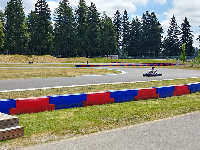 The winding track at PGP Motorsports Park beckons speed enthusiasts with its professional-grade curves and the serene backdrop of Washington's evergreens.