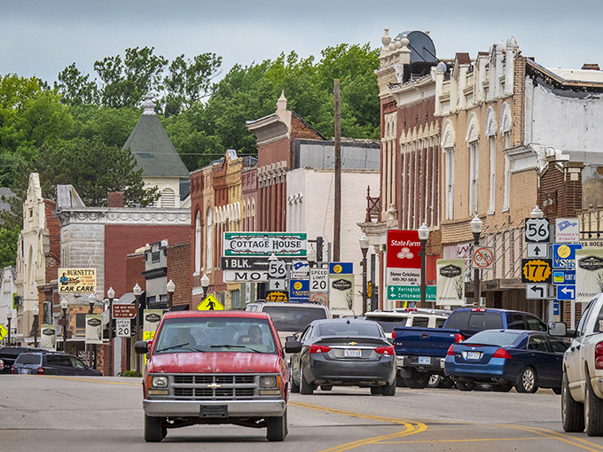 Historic brick buildings line Main Street in Council Grove, where the past isn't just preserved—it's still open for business.