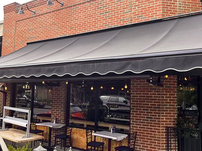 Stella's brick exterior with its elegant black awning creates the perfect first impression &ndash; unpretentious yet inviting, like a warm Greek hug waiting to happen.