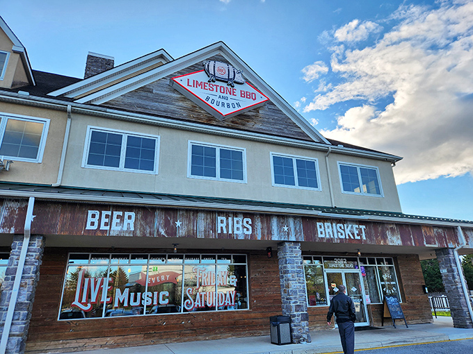 The rustic wooden fa&ccedil;ade of Limestone BBQ and Bourbon promises what every barbecue pilgrim seeks: a temple where smoke, meat, and time create magic.
