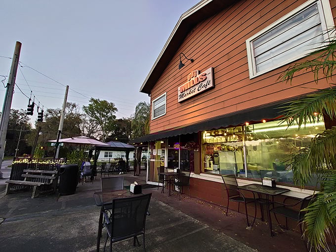 The rustic wooden exterior of 903 Mills Market beckons like an old friend, promising comfort food and zero pretension in Orlando's Mills 50 district.