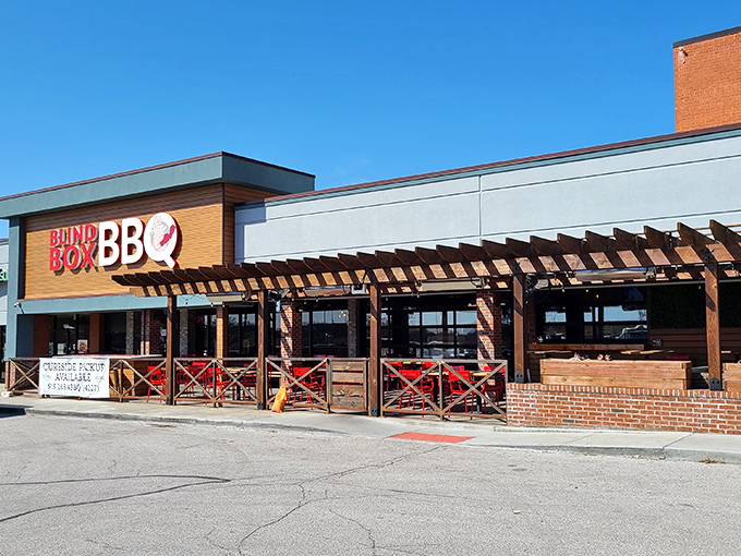 The bright orange facade of Blind Box BBQ stands out like a beacon for hungry barbecue pilgrims. No smoke signals needed&mdash;you can smell the goodness from the parking lot.