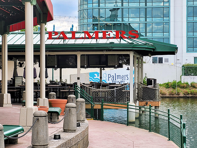 Palmer's waterfront patio feels like finding a coastal retreat in the heart of Kentucky. The green roof and lakeside seating create vacation vibes without the TSA pat-down.