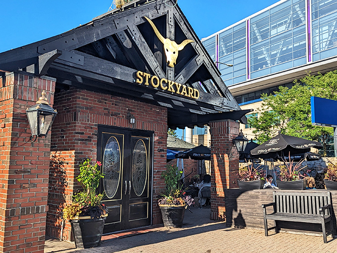 The grand entrance beckons with its iconic golden longhorn skull, promising carnivorous delights within those brick walls. Massachusetts hospitality with a Texas accent.