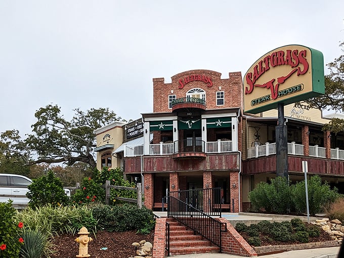 The brick facade of Saltgrass Steak House in Biloxi stands like a carnivore's castle, promising meaty treasures within its Texas-inspired walls.
