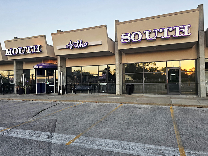 Those vibrant purple umbrellas are like beacons of flavor, signaling that this unassuming Omaha storefront houses serious Southern magic.