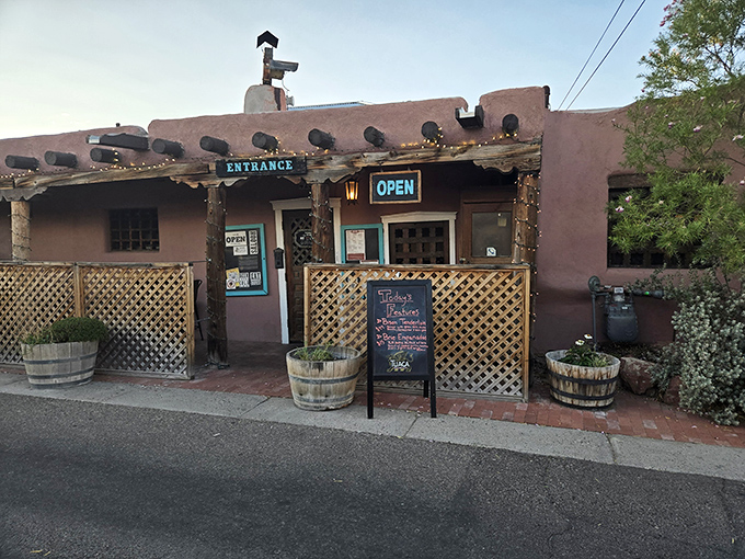 The iconic adobe façade of High Noon stands like a sentinel of Southwestern cuisine, complete with wooden vigas and that unmistakable New Mexican charm.