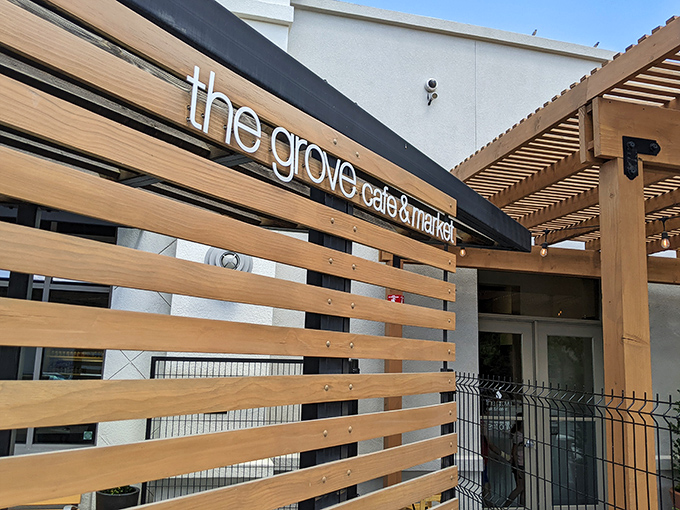 The Grove's unassuming exterior hides culinary treasures within, like finding a Michelin star restaurant disguised as your favorite aunt's house.