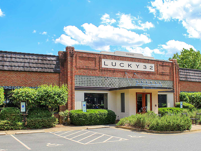 The brick facade of Lucky 32 stands like a Southern sentinel, promising culinary treasures within. No wonder folks make the pilgrimage from across the state.