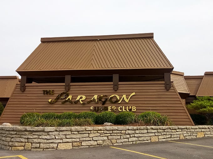 The unassuming exterior of The Paragon stands like a time capsule from the 1970s, promising retro delights within its wood-paneled walls.