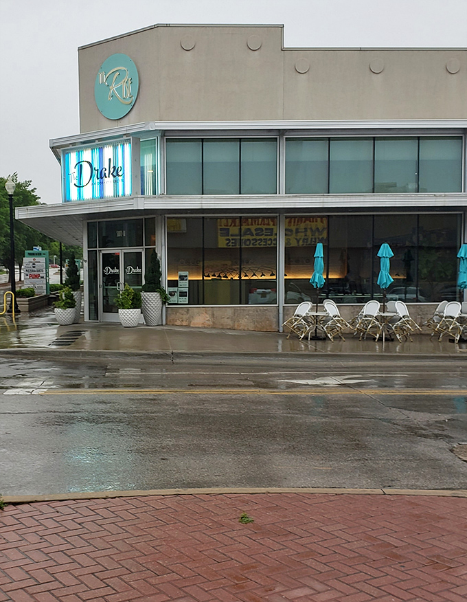 The Drake's sleek Art Deco exterior stands proudly at the corner of NW 23rd and Walker, a beacon of culinary sophistication in Oklahoma City's Uptown district.