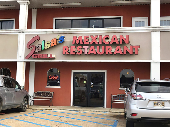 The rainbow-colored sign beckons hungry travelers like a neon oasis in Clinton. Come for the colors, stay for the culinary revelations. 