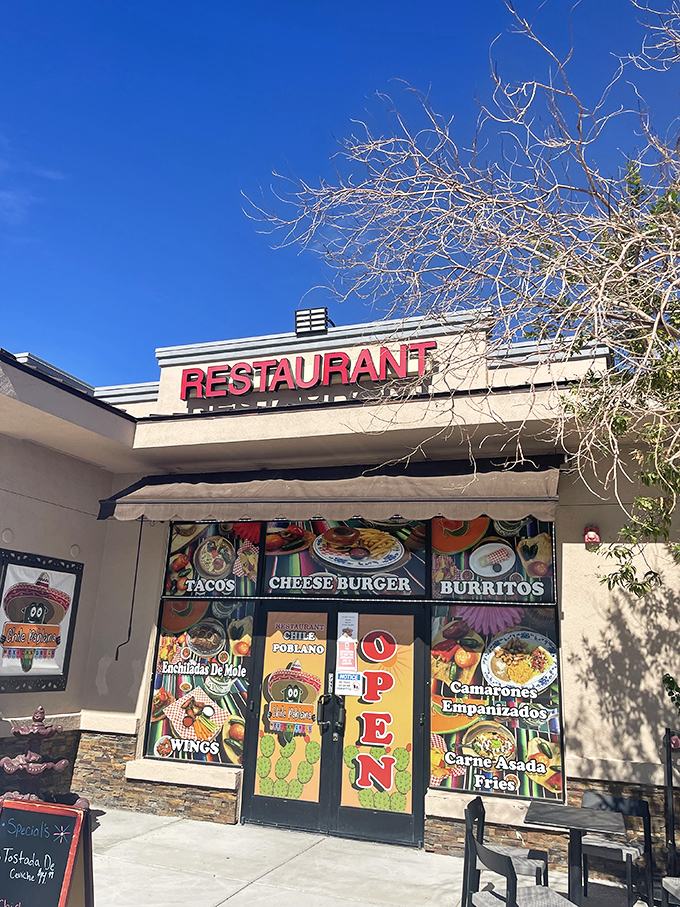 The vibrant facade of Chile Poblano beckons from the roadside in Moapa, a visual menu promising culinary adventures that await inside.
