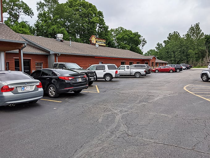 The glowing sign beckons hungry travelers like a smoky lighthouse guiding ships to delicious harbor. BBQ paradise awaits!