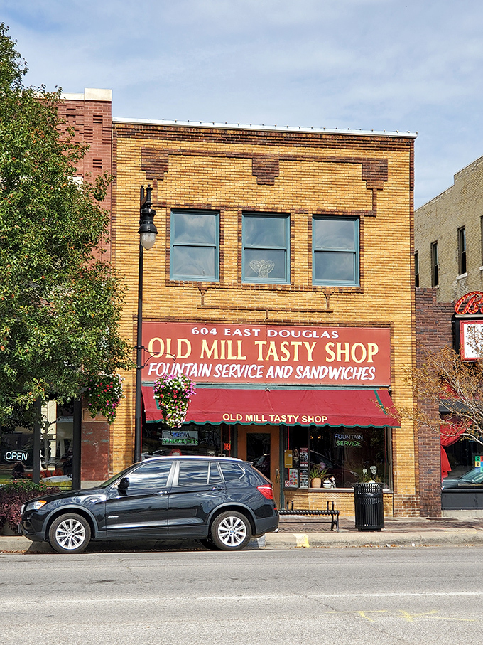 The Old Mill Tasty Shop's brick fa&ccedil;ade stands proudly on Douglas Avenue, a time capsule of Americana that's been satisfying Wichita's comfort food cravings for generations.