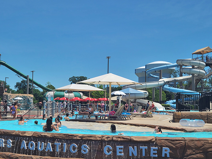 The aquatic wonderland where Arkansas goes to pretend it's oceanfront property. Those white and blue slides promise the kind of adrenaline rush usually reserved for tax audits.