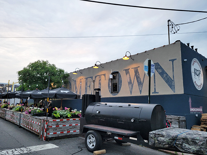 The blue exterior of Hometown Bar-B-Que stands like a beacon for meat pilgrims, promising smoky salvation inside this unassuming Brooklyn treasure.