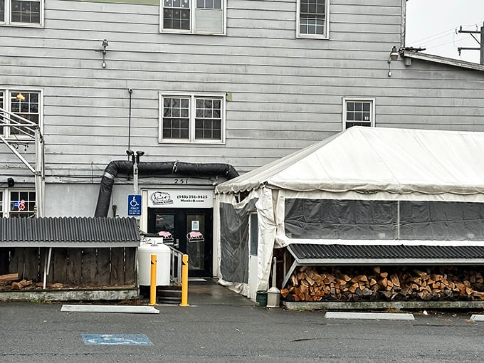 The white clapboard exterior of Monk's might seem unassuming, but those stacks of firewood tell you everything you need to know: smoke signals of deliciousness await inside.