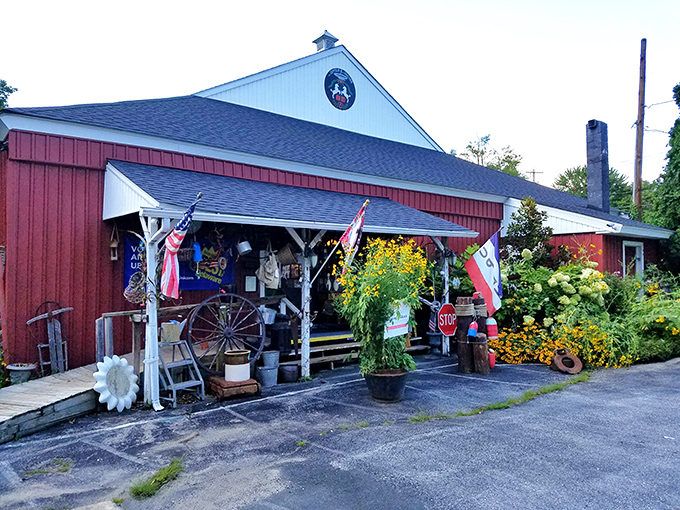The red barn exterior of The Zeppelin and The Unicorn beckons like a portal to another time. Vibrant flowers and vintage flags hint at the treasures within.
