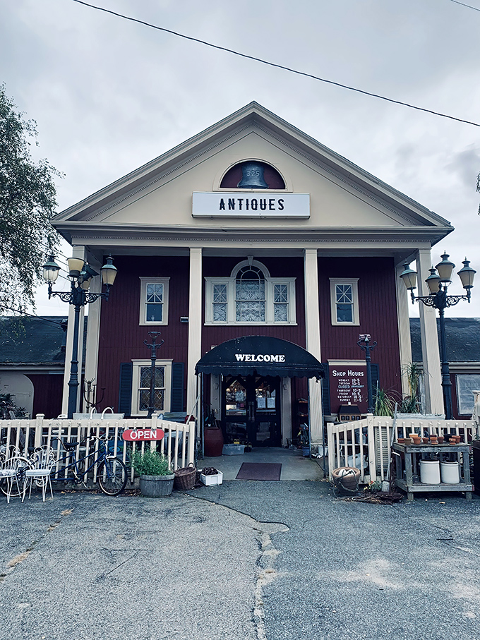A New England time portal disguised as a charming red building with white trim. Cape Cod's architectural equivalent of "come on in, we've got stories to tell." 