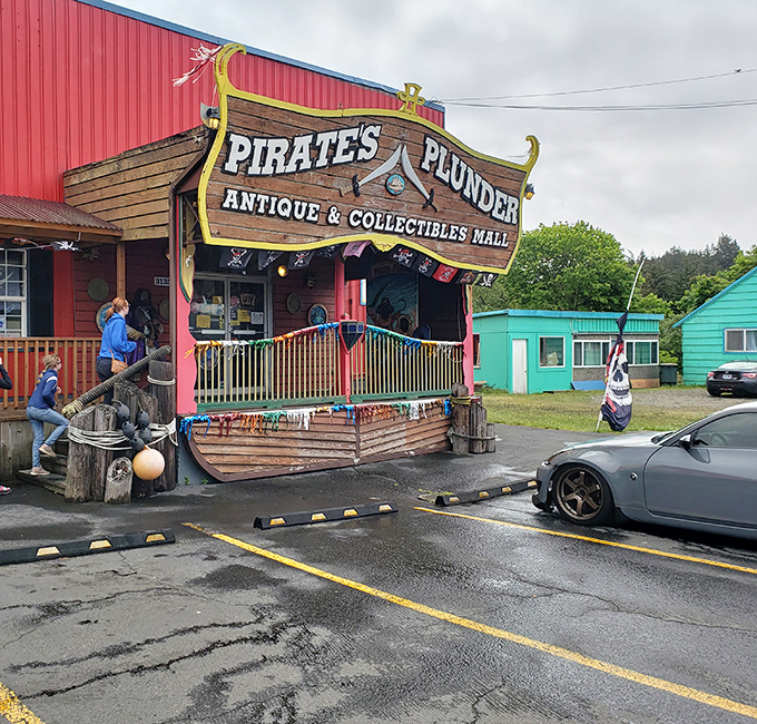 The ship has come ashore! Pirate's Plunder's wooden ship-shaped entrance promises treasures within, complete with colorful flags and nautical charm.