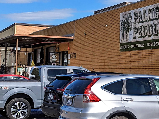 The iconic Palmetto Peddlers sign promises a treasure trove within those unassuming brick walls, like a history book with its cover closed.