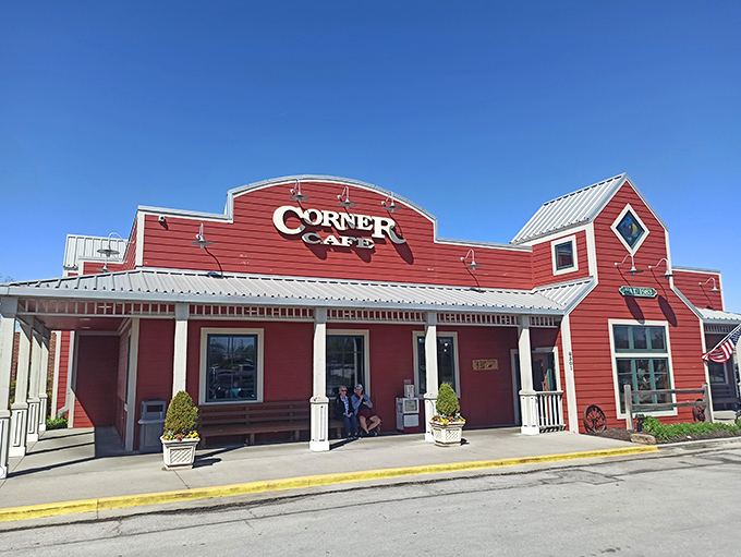 The iconic red barn exterior of Corner Cafe beckons hungry travelers like a lighthouse for growling stomachs on the Missouri prairie.