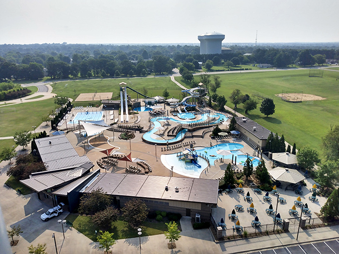 The aquatic wonderland where Arkansas goes to pretend it's oceanfront property. Those white and blue slides promise the kind of adrenaline rush usually reserved for tax audits.