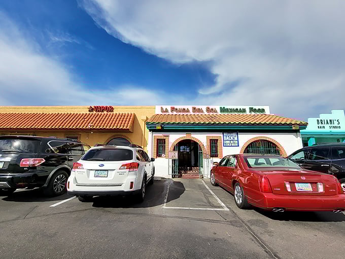 The unassuming entrance to flavor paradise. La Fonda Del Sol's charming exterior promises authentic Mexican cuisine behind those welcoming doors.