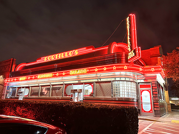 The neon-drenched exterior of Portillo's glows like a beacon of Midwestern comfort food in the Southern California night. Chicago never looked so good in California.