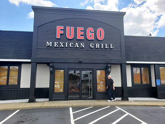 The understated exterior belies the flavor explosion waiting inside. Fuego's sleek black facade with bold red lettering makes a confident statement without the neon sombrero clich&eacute;s.