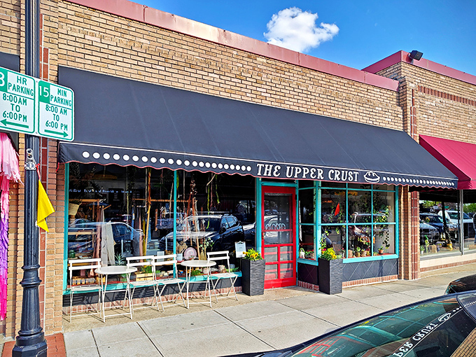 The unassuming storefront of The Upper Crust hides culinary treasures that would make any dessert detective's career. The black awning and brick fa&ccedil;ade promise old-school authenticity.