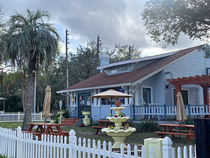 A blue cottage with palm trees and picnic tables that looks more like your favorite aunt's beach house than a restaurant. Culinary surprises hide in plain sight.