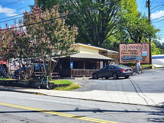 Nestled among flowering trees, Woody's unassuming exterior is like finding a secret Philadelphia embassy on Atlanta soil. Cheesesteak diplomacy at its finest.