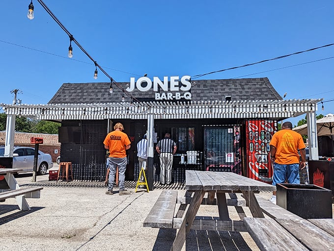 The unassuming black exterior of Jones Bar-B-Q speaks volumes: great barbecue doesn't need fancy digs, just smoke, skill, and soul.