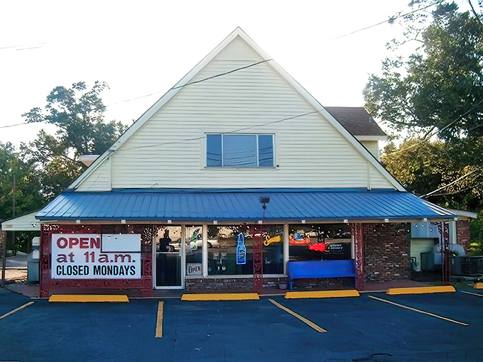 The unassuming A-frame exterior with its bright blue awning and red signage is like a secret handshake&mdash;those who know, know.