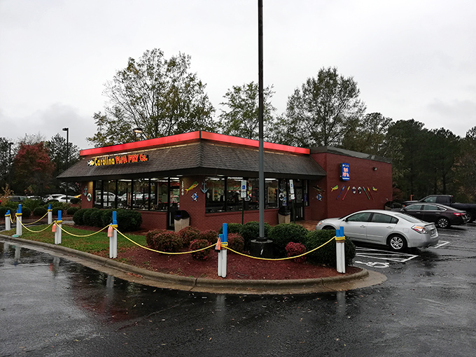 The unassuming brick exterior might fool you, but like Clark Kent's phone booth, this is where seafood magic happens. Photo Credit: Carolina Fish Fry Co.