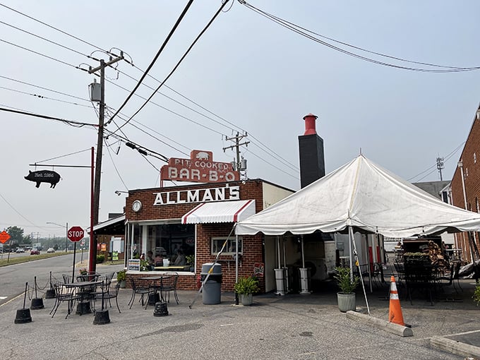 The iconic red chimney and vintage sign at Allman's have been beckoning hungry travelers since Eisenhower was signing bills. BBQ pilgrimage starts here.