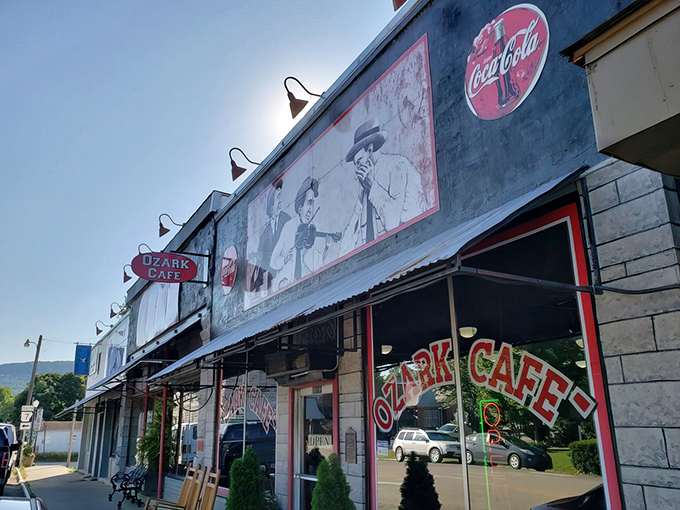 The classic facade of Ozark Cafe stands proudly on Jasper's main street, its vintage signage and Coca-Cola murals promising a time-traveling culinary adventure.