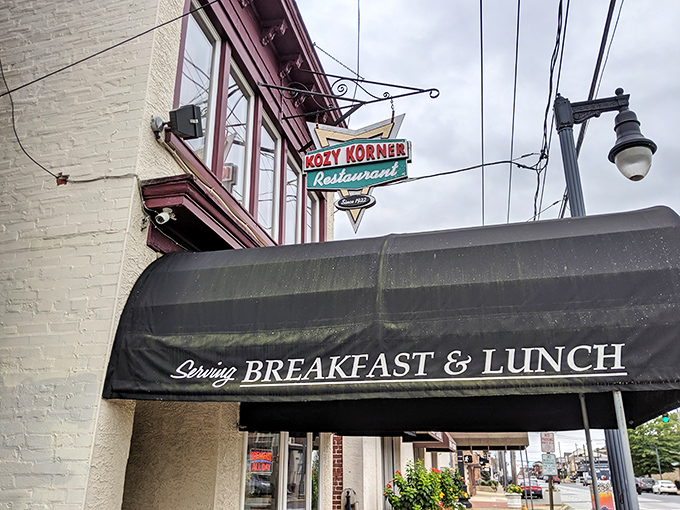 The unassuming black awning of Kozy Korner beckons like a secret handshake among breakfast aficionados. No flash, all substance.